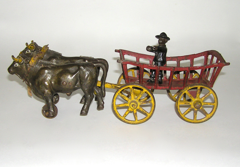 Rare Kenton Cast Iron Farm Stake Cart w/ Two Oxen Standing Driver