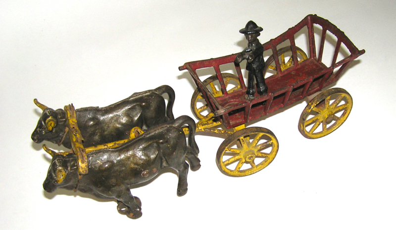 Rare Kenton Cast Iron Farm Stake Cart w/ Two Oxen Standing Driver